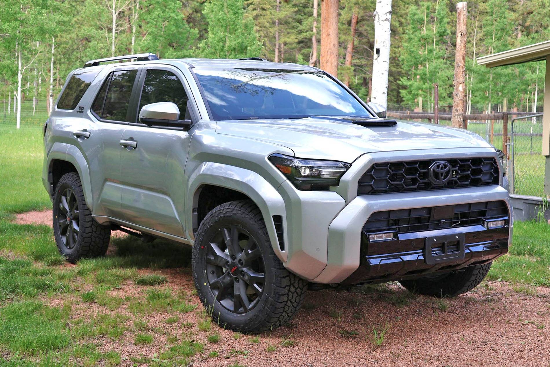 275/60/20 Wildpeak AT4 tires on stock TRD Sport wheels (powder coated ...