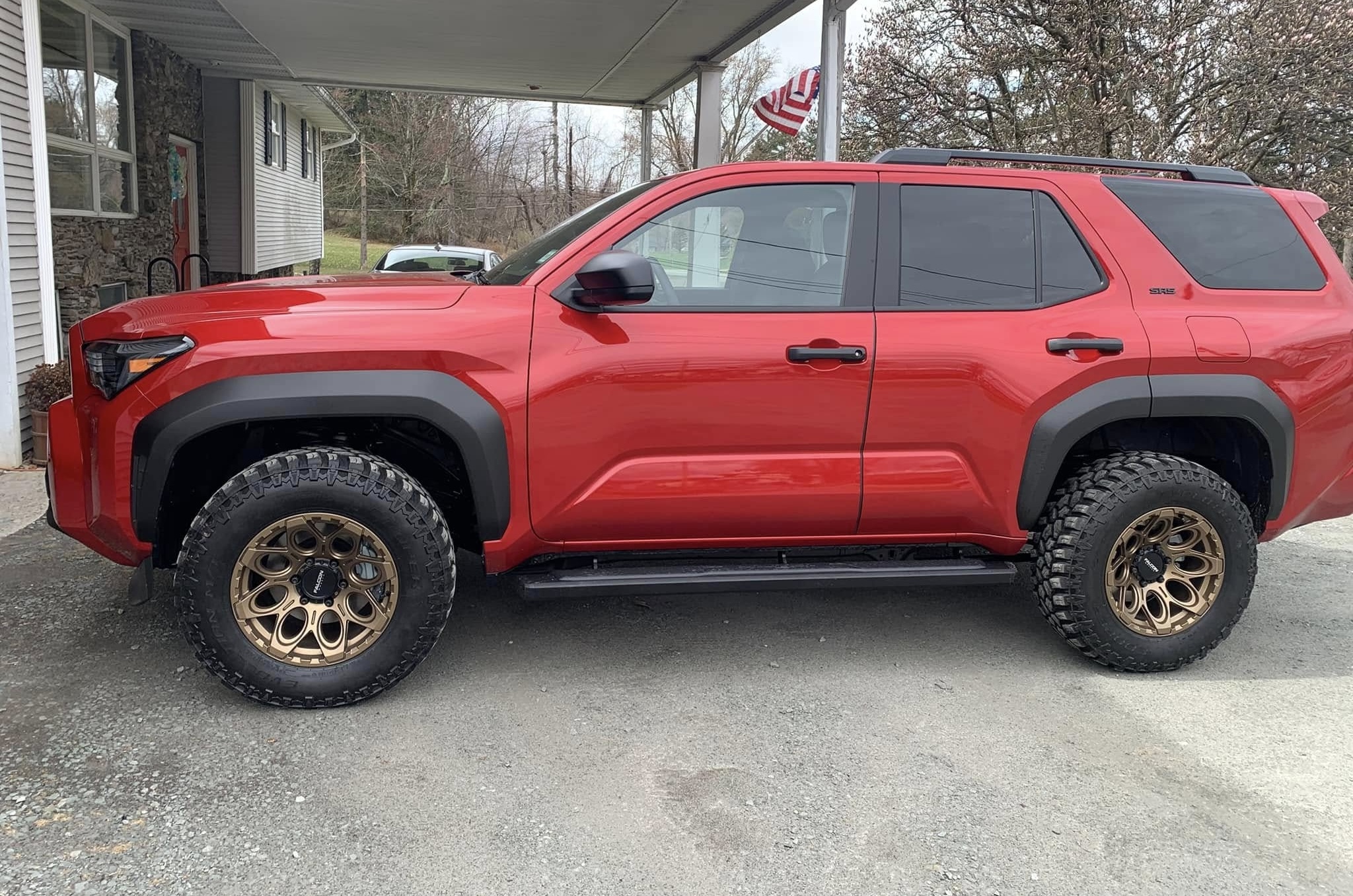 Supersonic Red SR5 on -12 offset wheels (bronze) and Cooper Evolution M ...