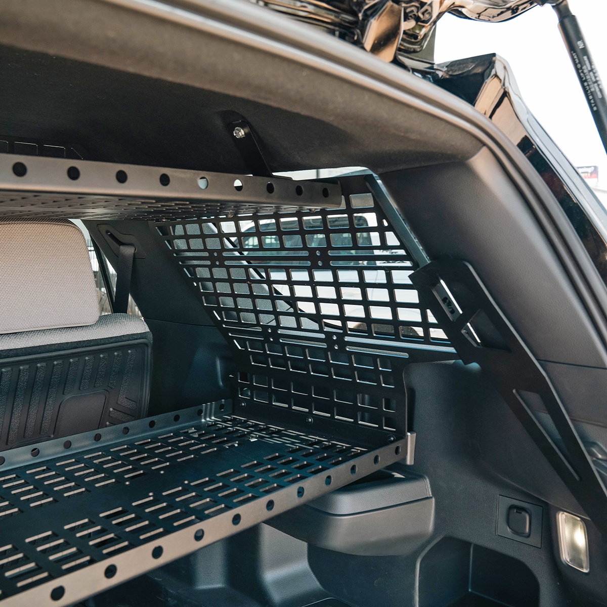 Cali Raised Interior Window Molle Panels and Overhead Tray installed in ...